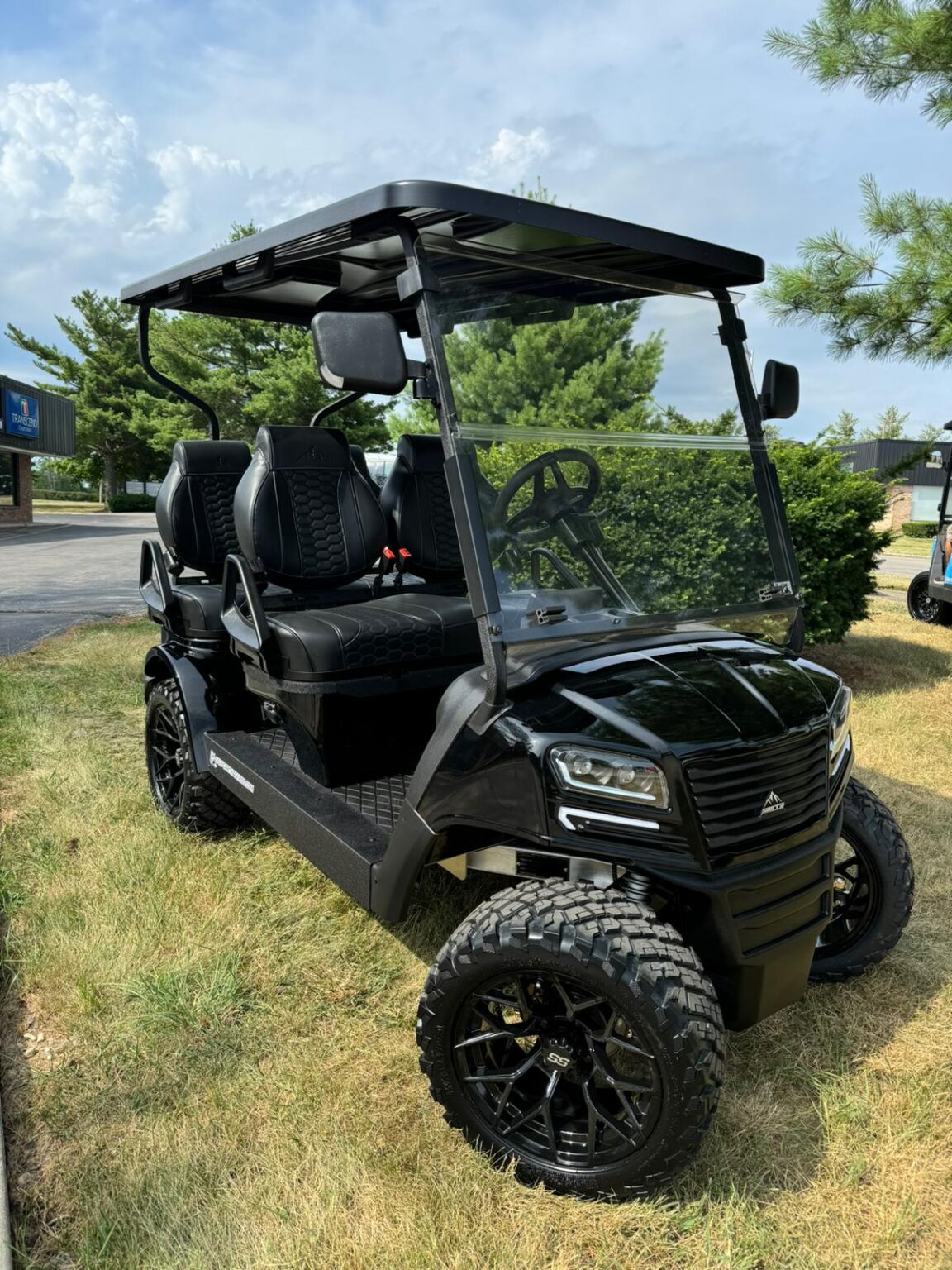 2025 Sierra AX4 Lithium - Metallic Black - All 4 seats facing front ...
